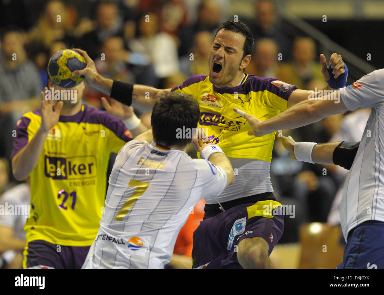 Berlin's Iker Romero (R) is blocked by Hamburg's Matthias Flohr (L ...