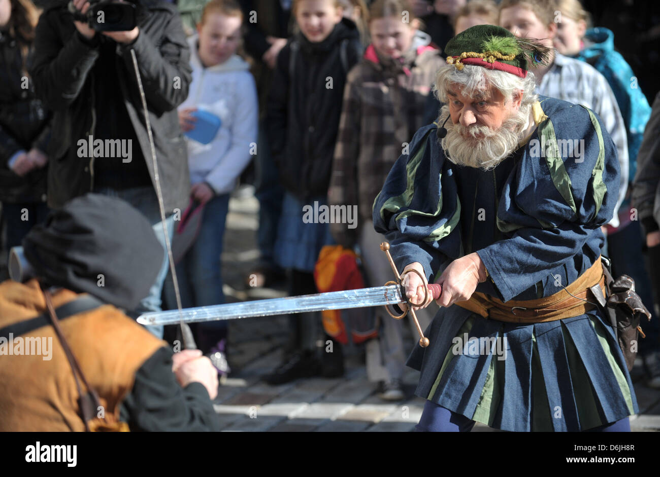 Actor Dieter Jorschik dressed as buccaneer Klaus Stoertebeker fights ...