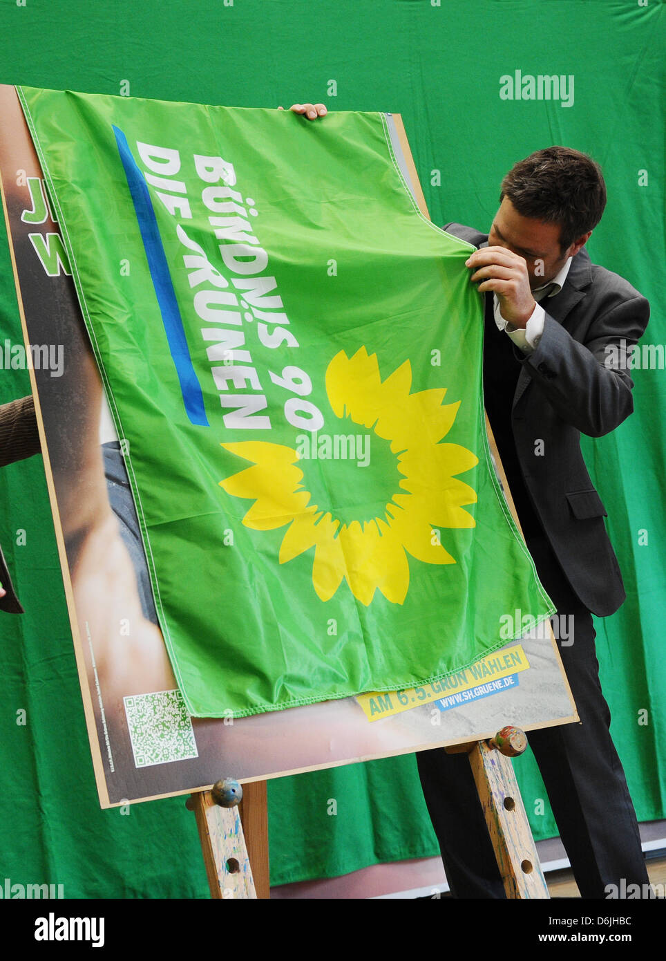 Green top candidate Robert Habeck unveils an election campaign poster ...