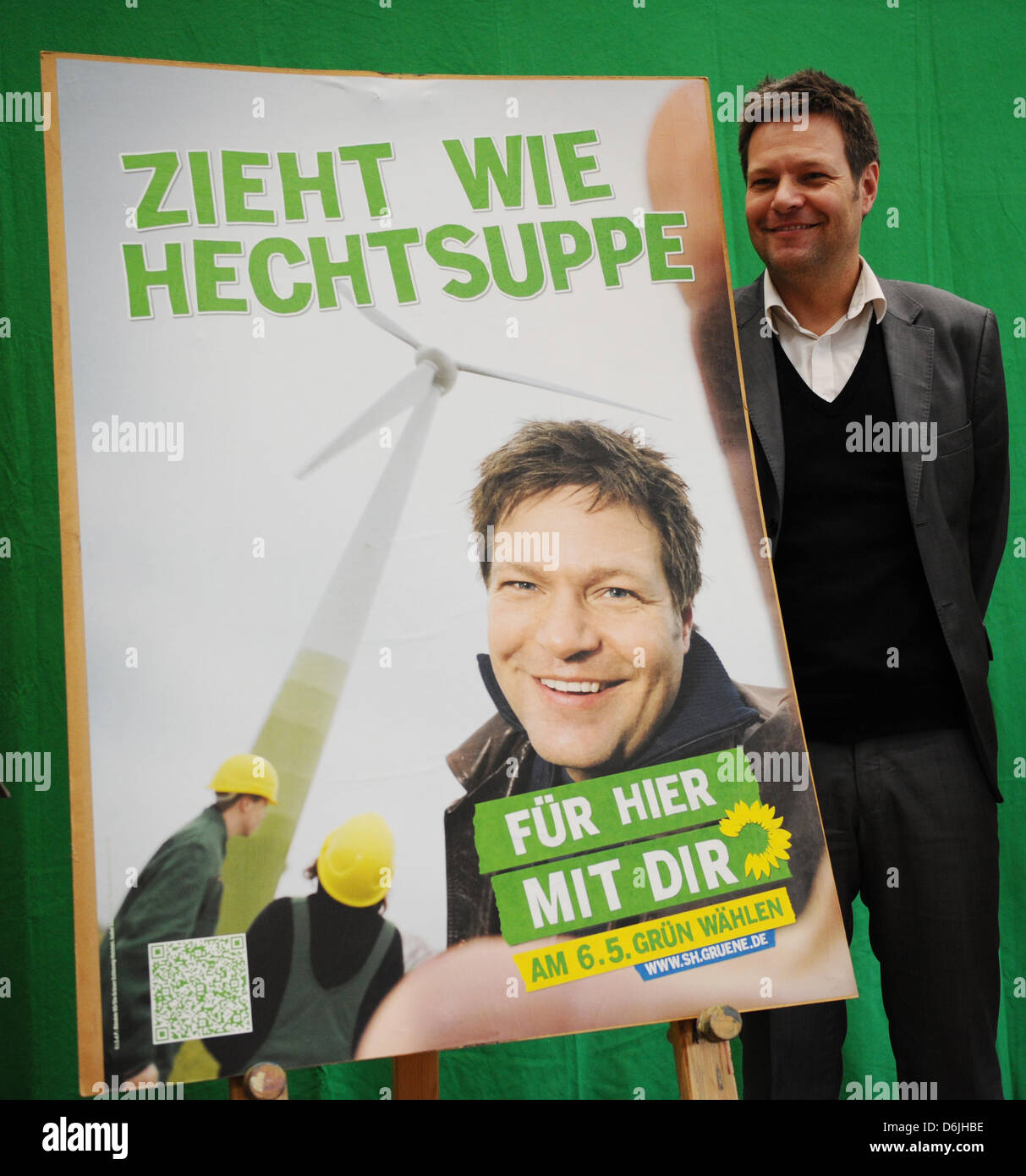Green top candidate Robert Habeck unveils an election campaign poster ...