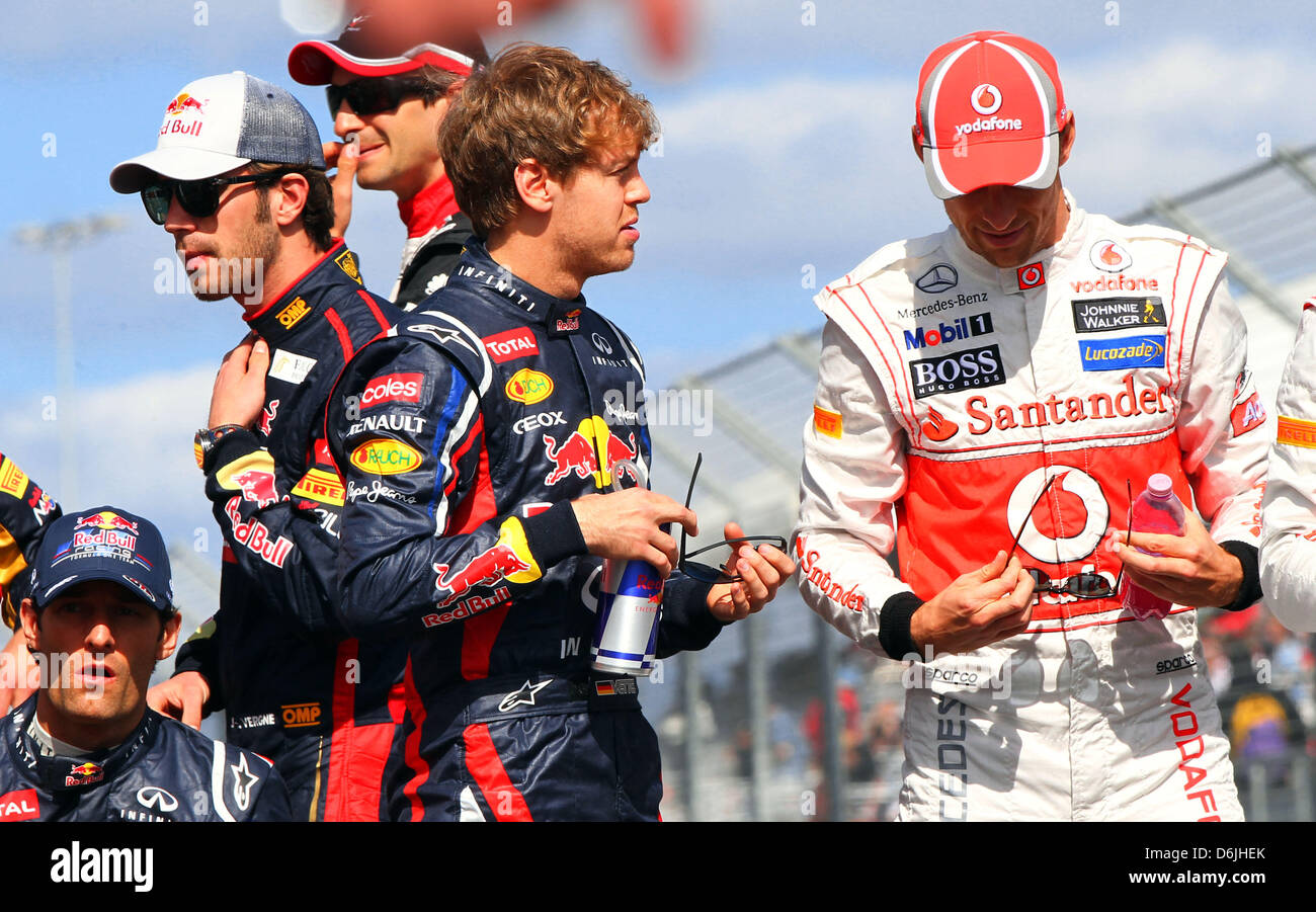 German Formula One driver Sebastian Vettel (L) of Red Bull and British ...