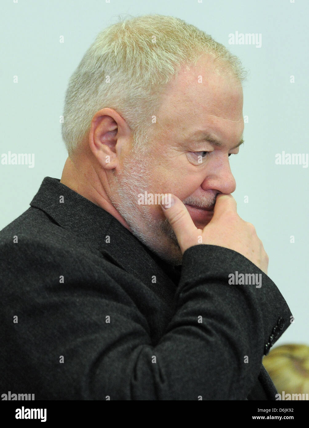 Hotelier Axel Hilpert waits for his hearing to start in a courtroom in ...