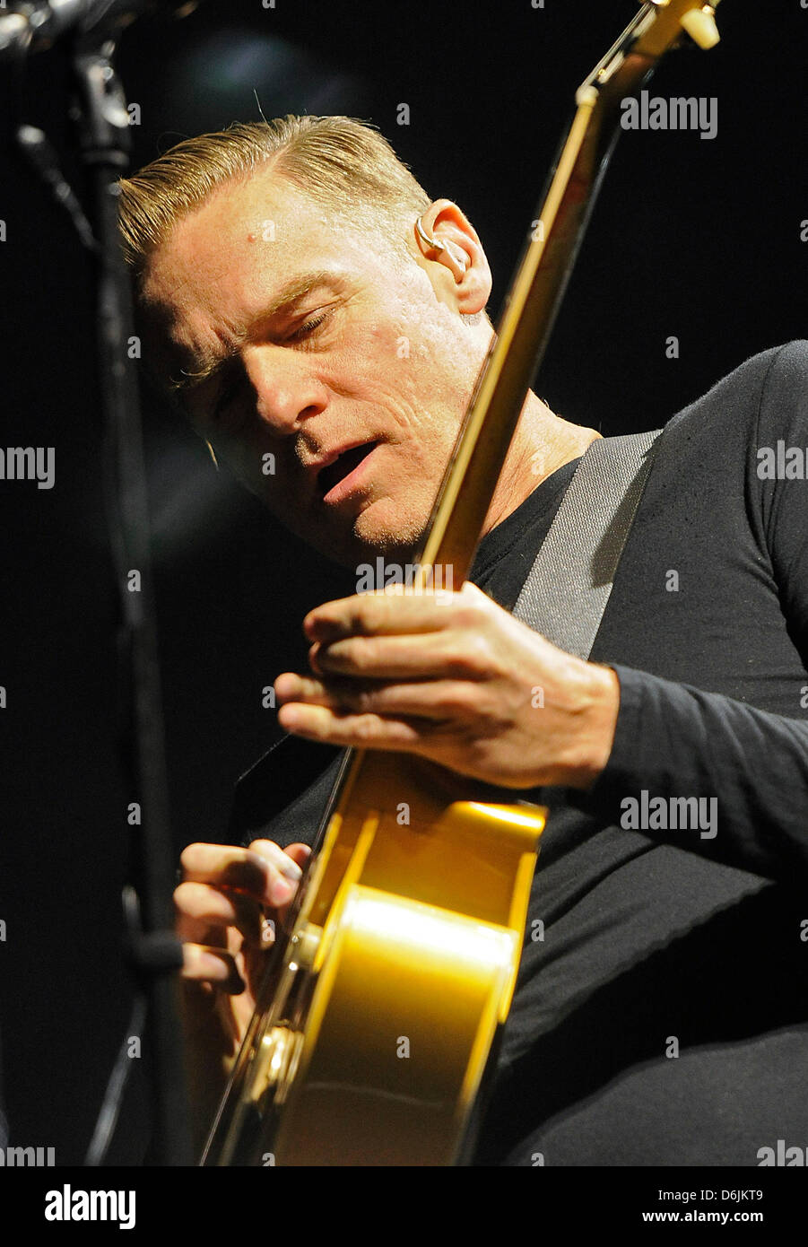 Bryan Adams performs on stage during a concert in Cologne, Germany, 21 ...