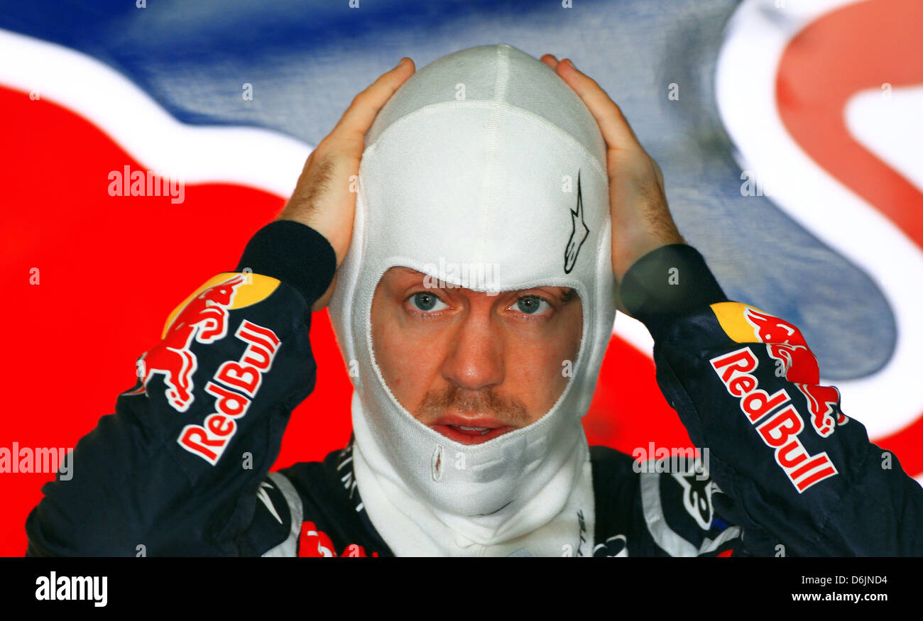 German Formula One driver Sebastian Vettel of Red Bull prepares for the ...