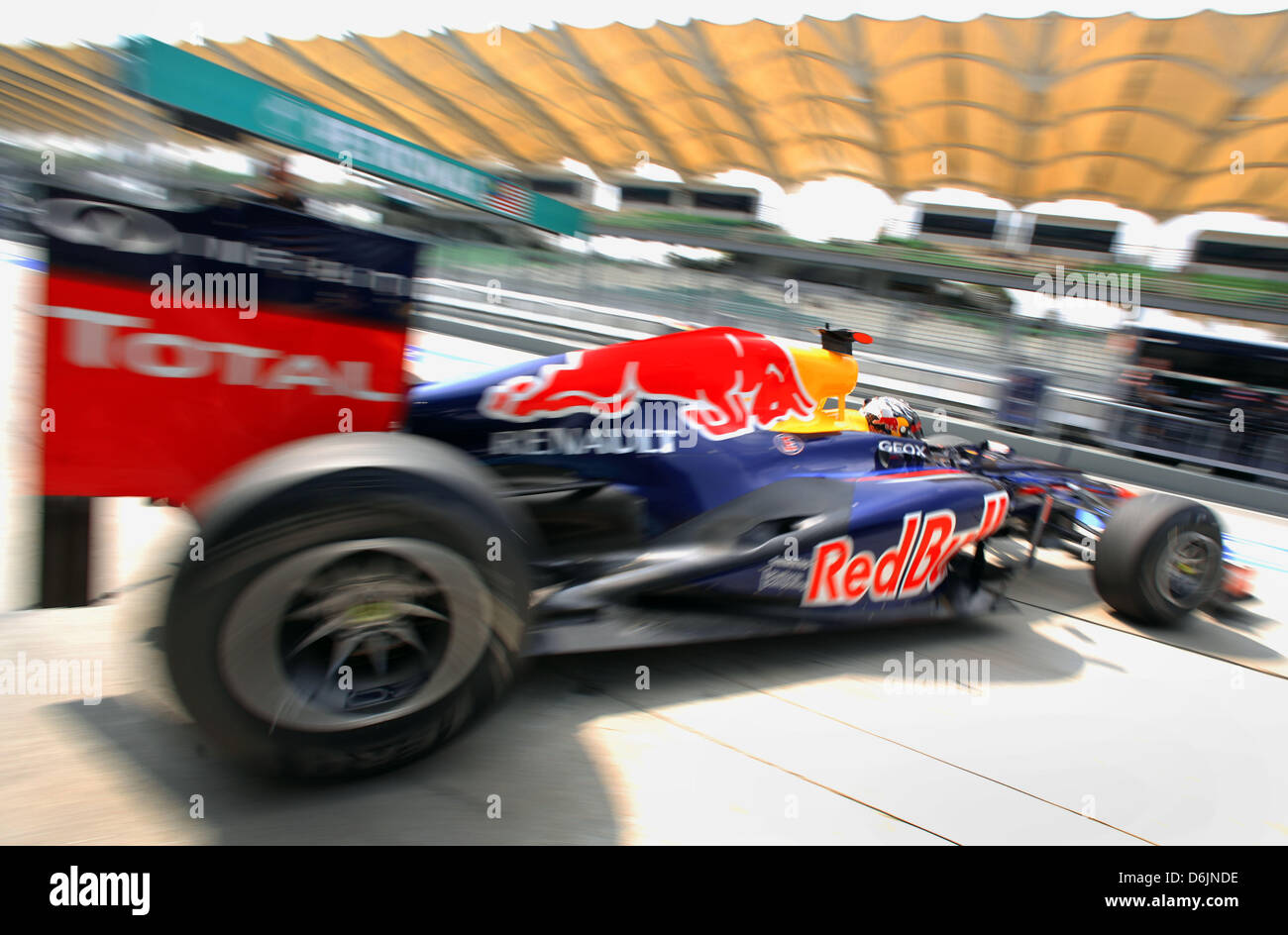 German Formula One driver Sebastian Vettel of Red Bull drives his ...