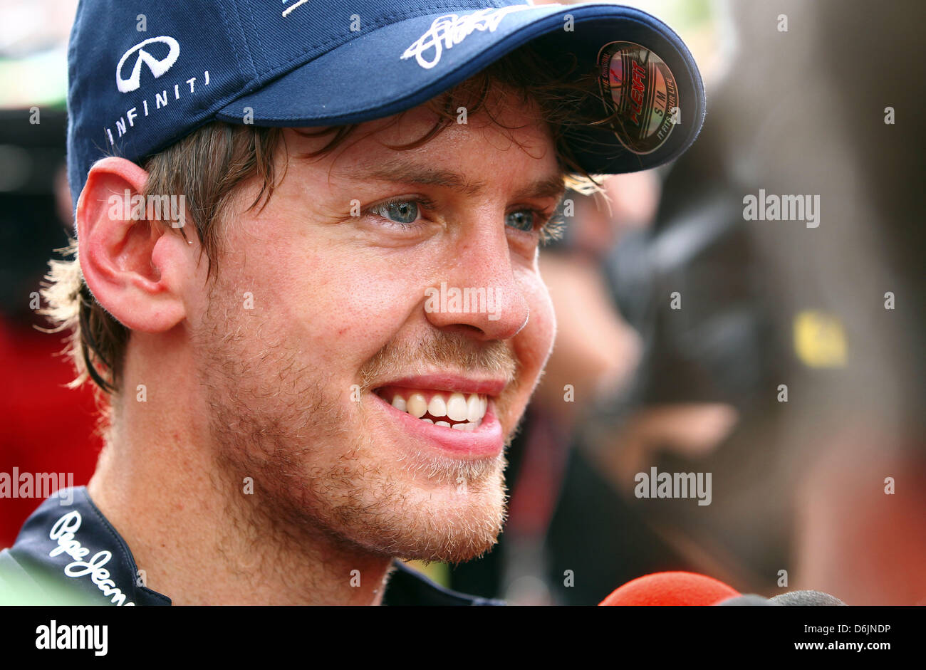German Formula One driver Sebastian Vettel of Red Bull talks to ...