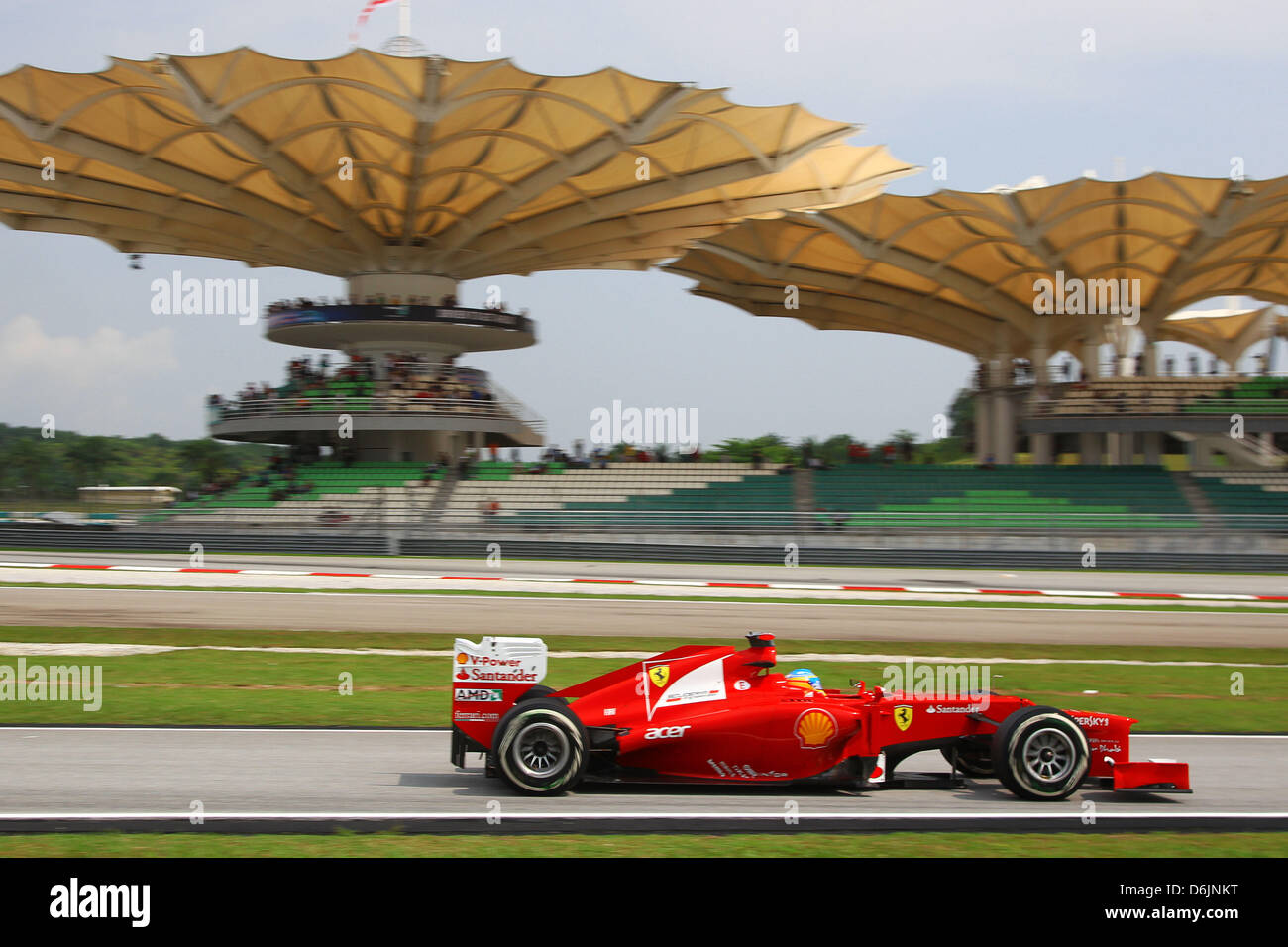 Spanish Formula One driver Fernando Alonso of Ferrari steers his car in ...
