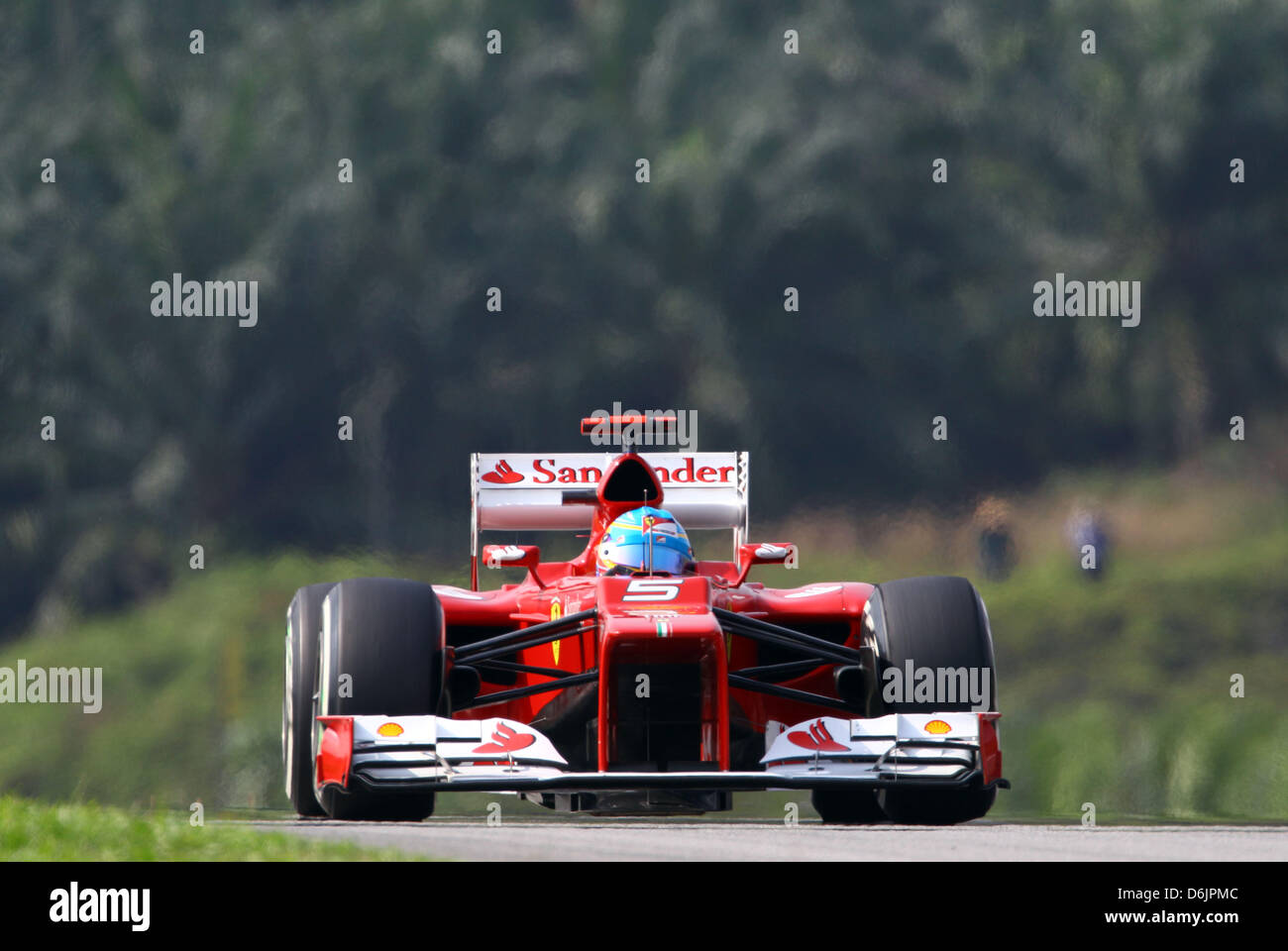 Spanish Formula One driver Fernando Alonso of Ferrari steers his car ...
