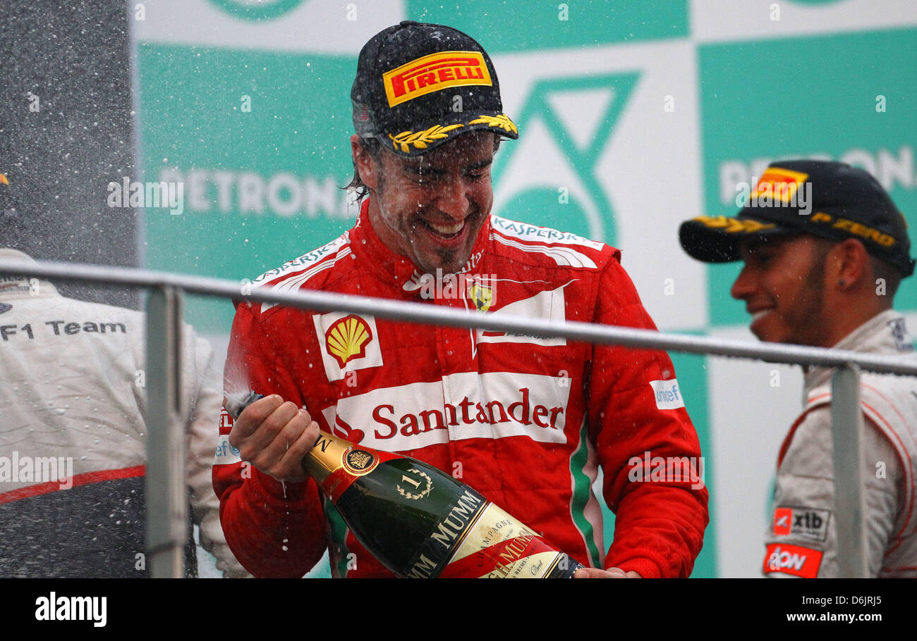 Spanish Formula One driver Fernando Alonso of Ferrari celebrates on the ...