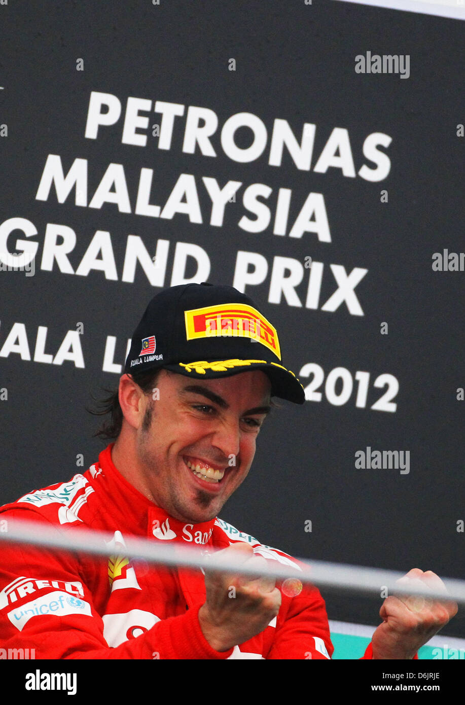 Spanish Formula One driver Fernando Alonso of Ferrari celebrates on the ...