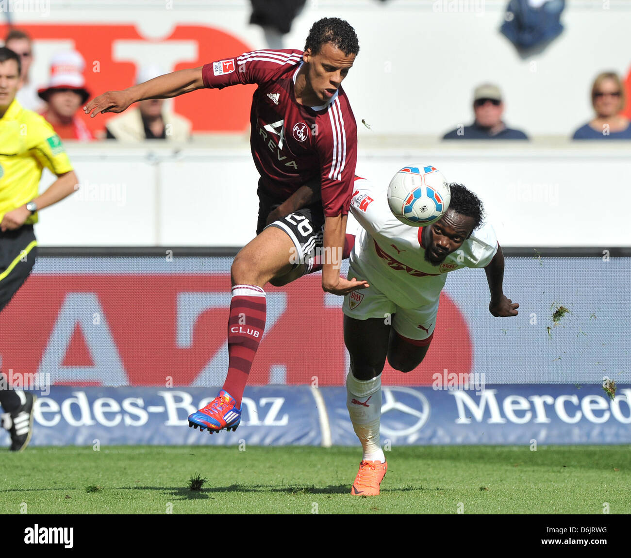 Stuttgart's Arthur Boka (R) vies for the ball with Nuremberg's Timothy ...