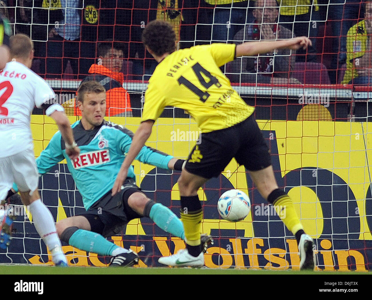 Dortmund's Ivan Perisic (R) scores the 1-6 against Cologne's goalkeeper ...