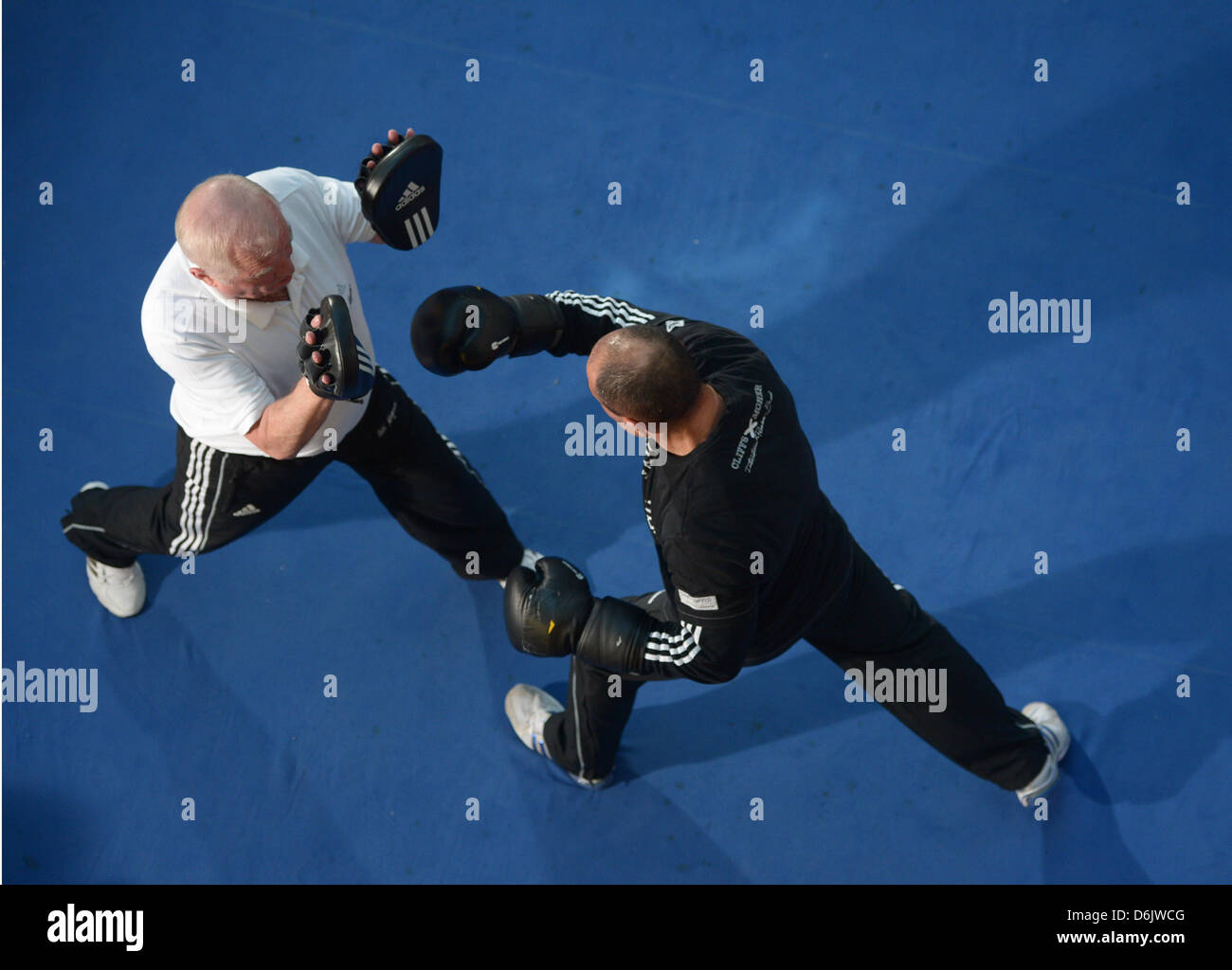 Boxer Arthur Abraham trains with his coach Ulli Wegner (R) during a ...