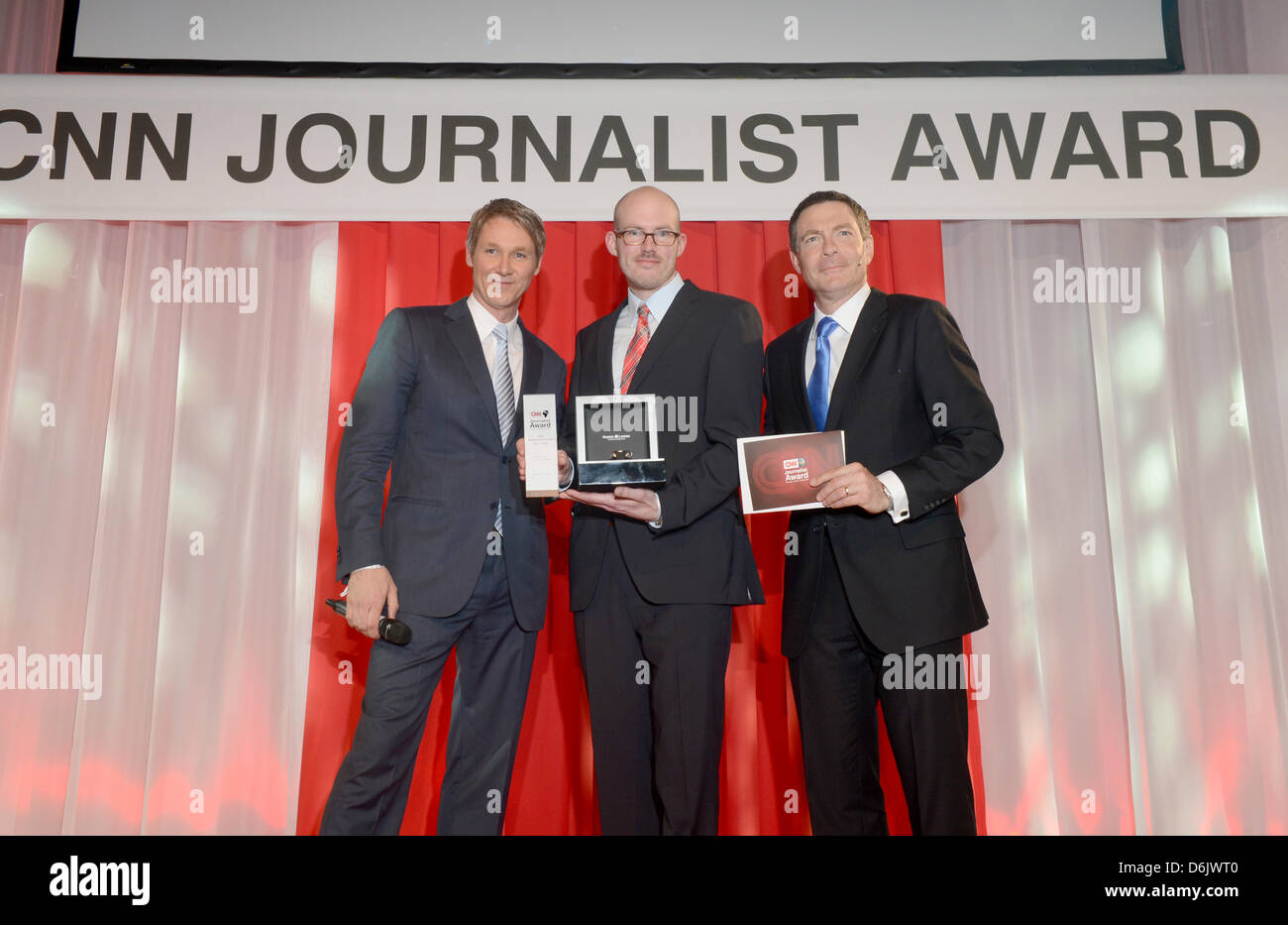Presentor Franz Fischlin (L-R), awards winner journalists photographer ...