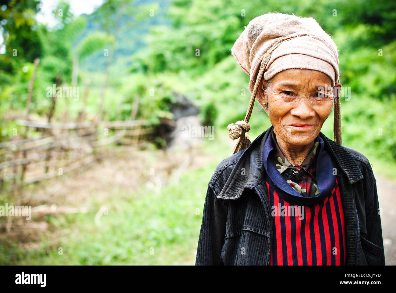 An elderly woman in a remote hillside village in Laos, Asia Stock Photo ...