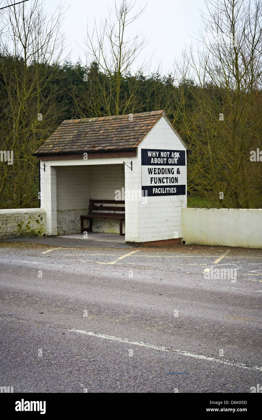 A rural bus stop with adverts for weddings and functions Stock Photo ...