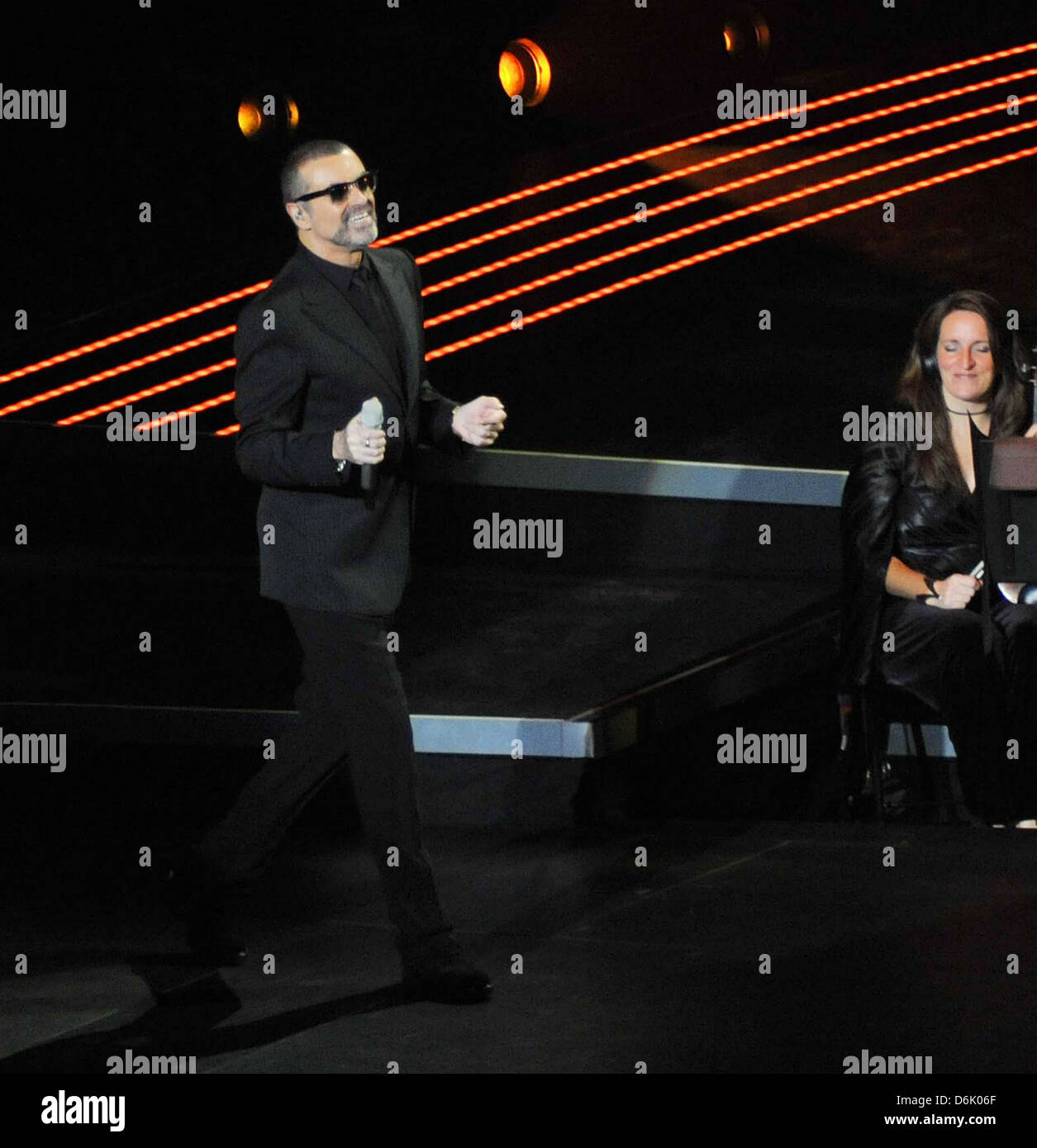 George Michael performs live at The O2 as part of his 'Symphonica' tour ...
