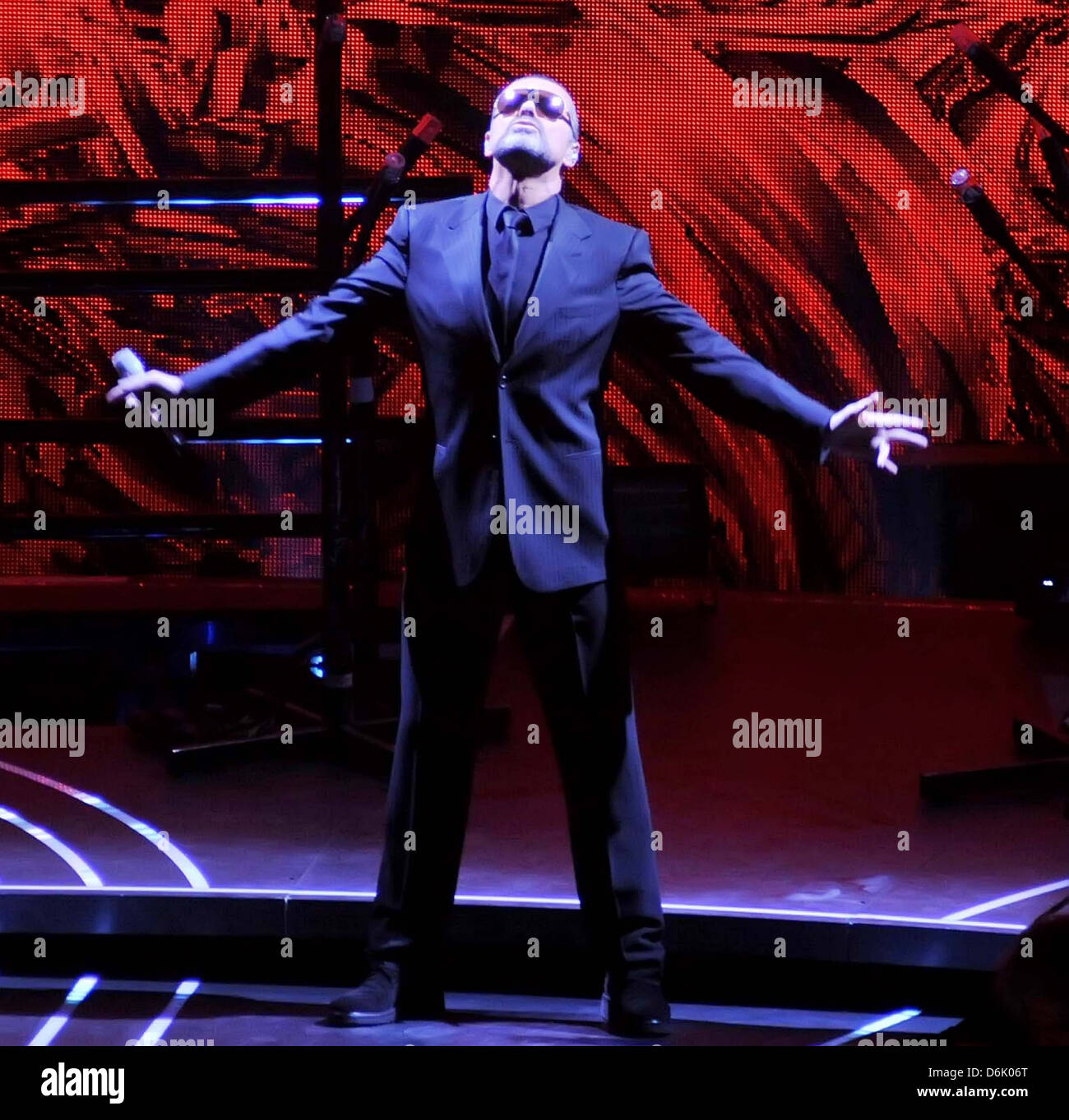 George Michael performs live at The O2 as part of his 'Symphonica' tour ...
