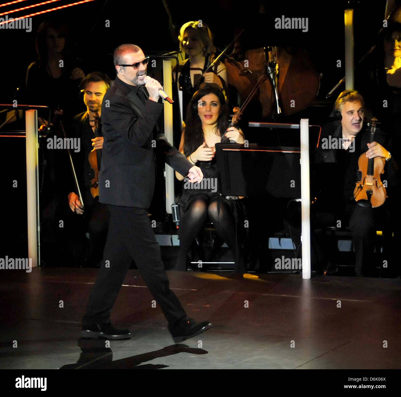 George Michael performs live at The O2 as part of his 'Symphonica' tour ...