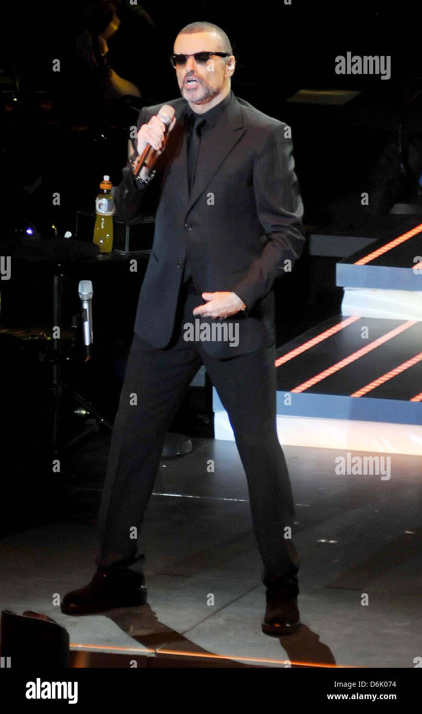 George Michael performs live at The O2 as part of his 'Symphonica' tour ...