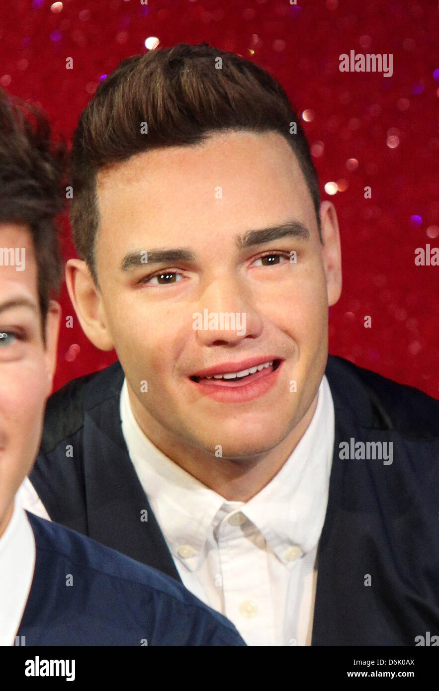 London, UK. April 18th 2013. Waxworks of One Direction are unveiled at ...