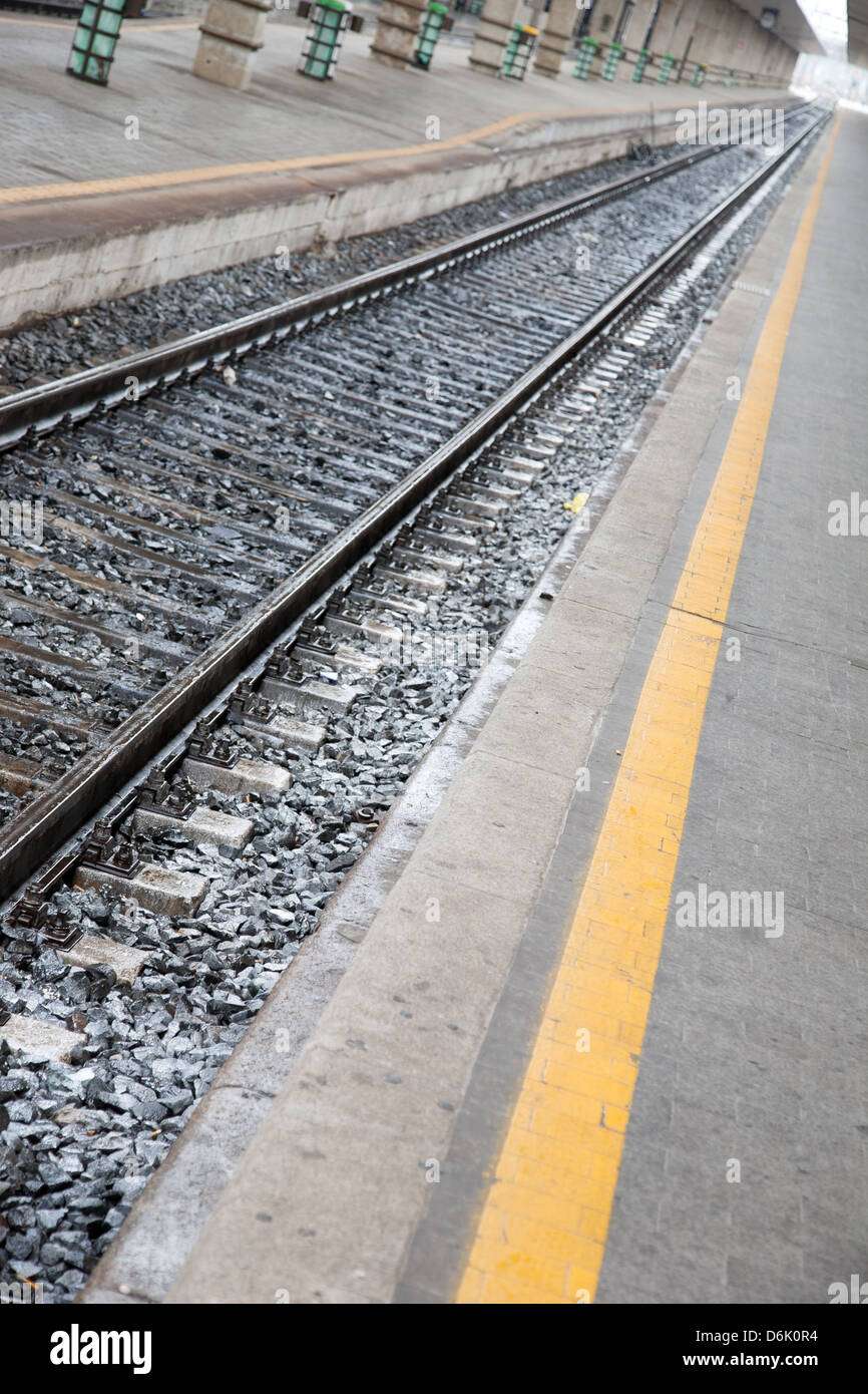 Railway Track and Platform with Yellow Line Stock Photo - Alamy