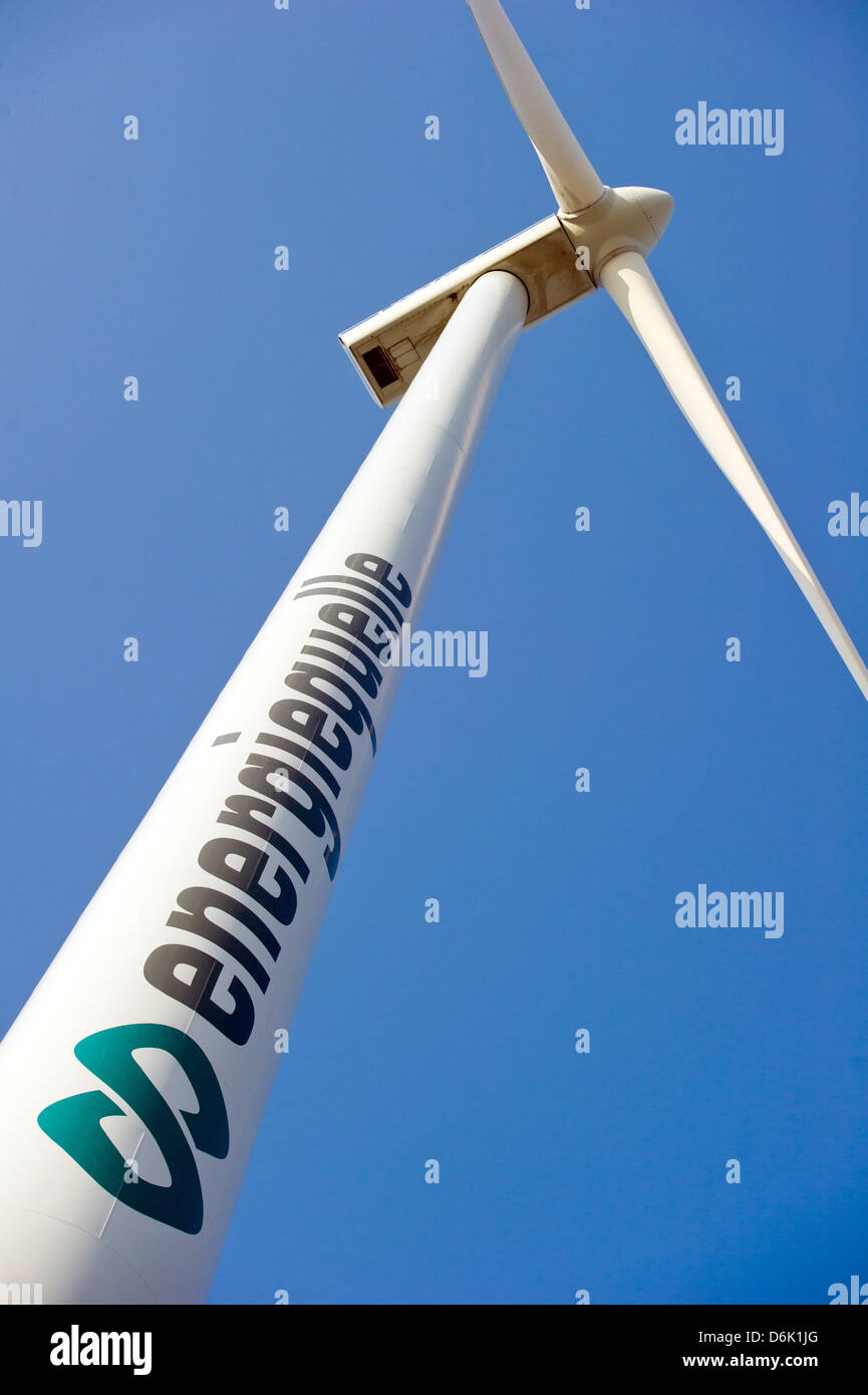 A wind turbine designed with the lettering 'infinite source of energy ...