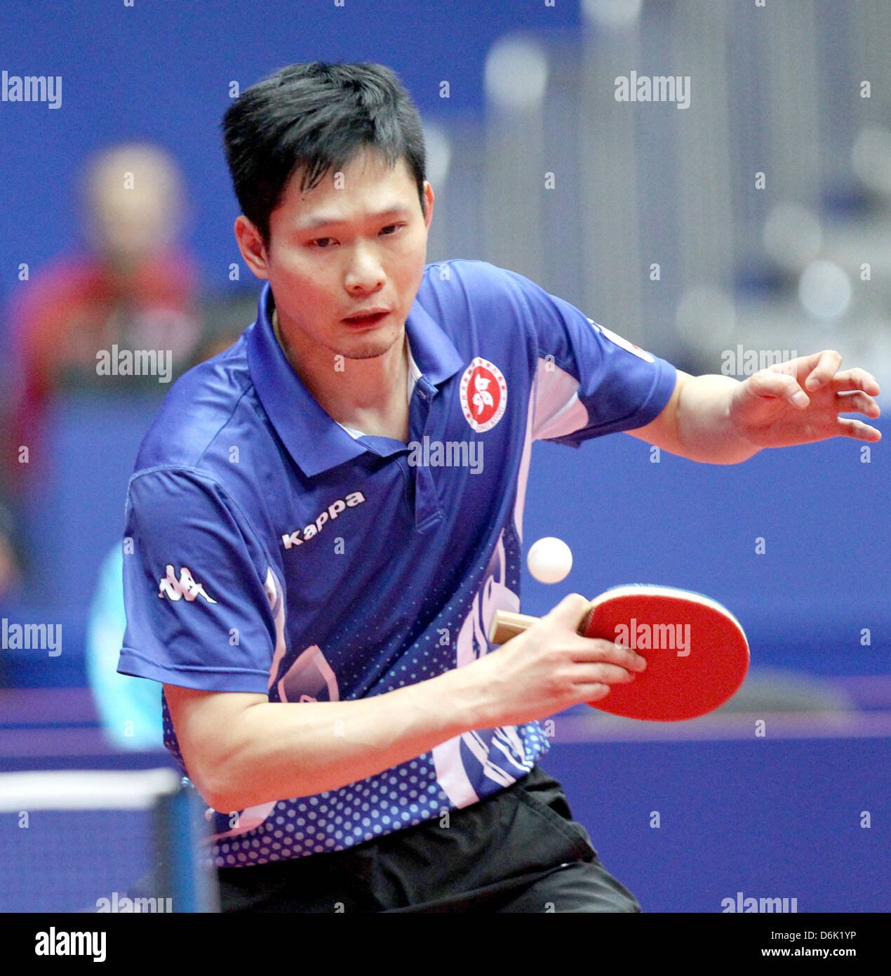 Hong Kong's Chu Yan Leung hits the ball during the men's round of the ...