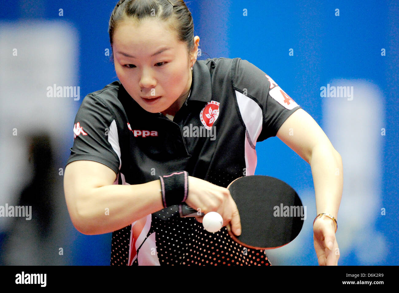 Hong Kong's Tie Yana hits the ball during the women's quarterfinal ...