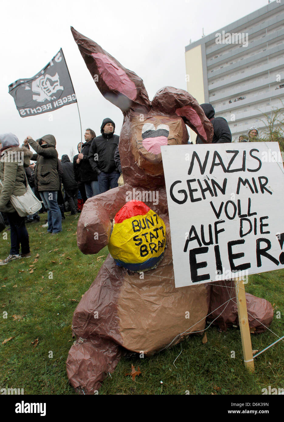 An Easter bunny holds a placard in its hand which reads 'Nazis geh'n ...