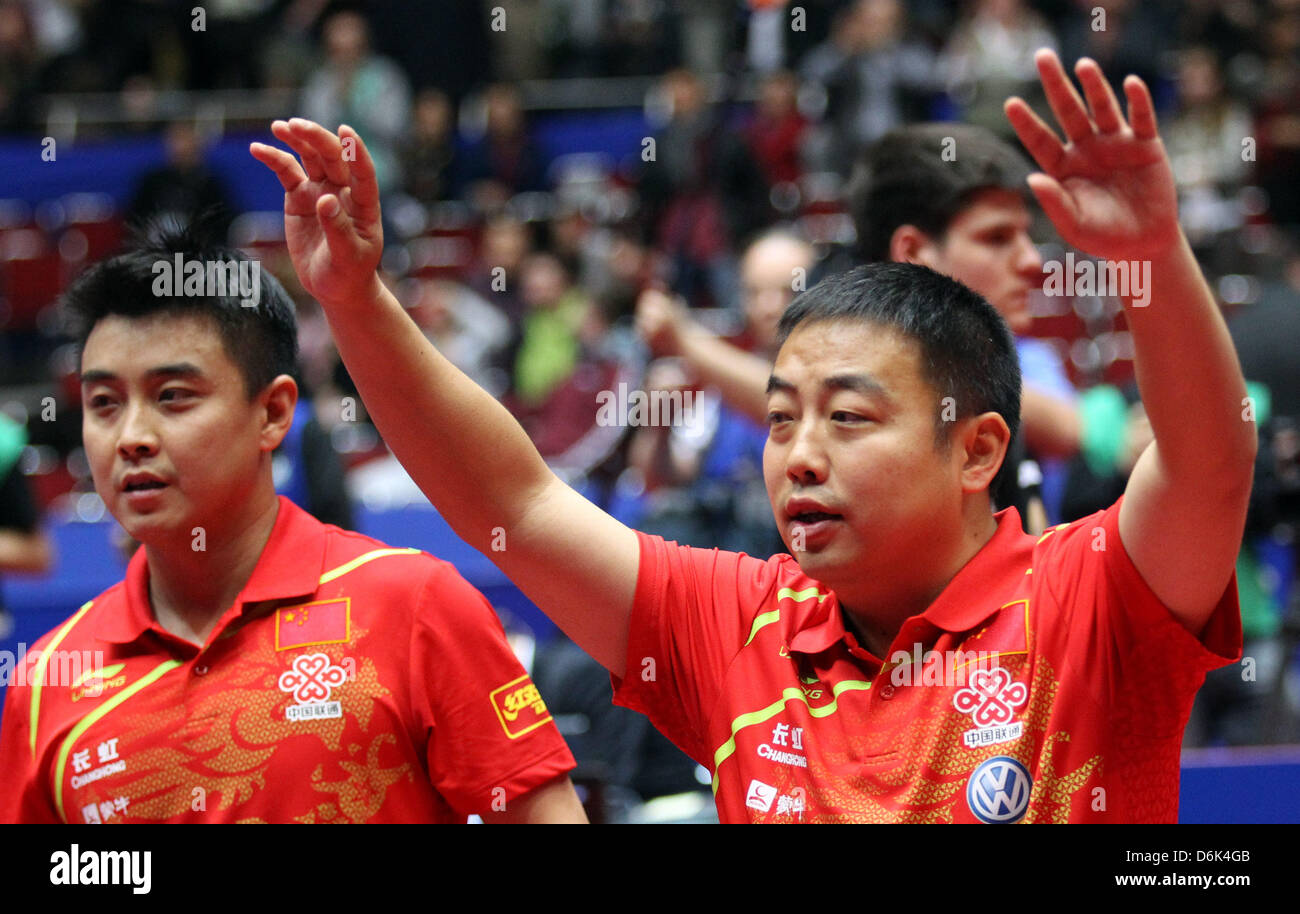 China's Wang Hao and national coach Liu Guoliang (R) celebrate China's ...