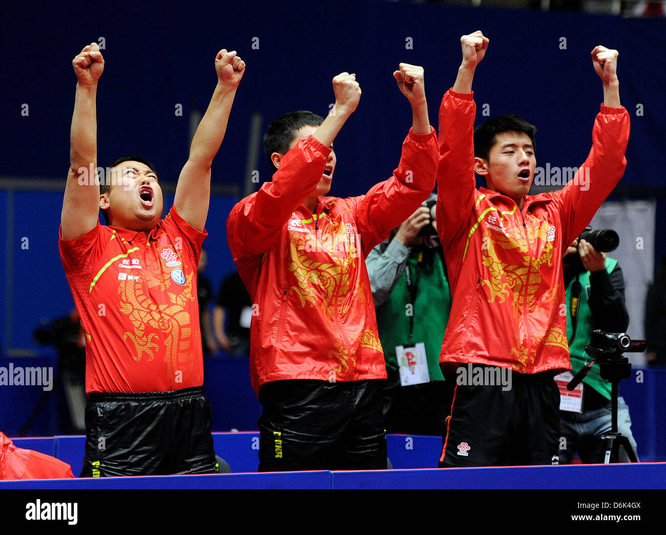 China's national coach Liu Guoliang (L-R) and players Xu Xin and Zhang ...