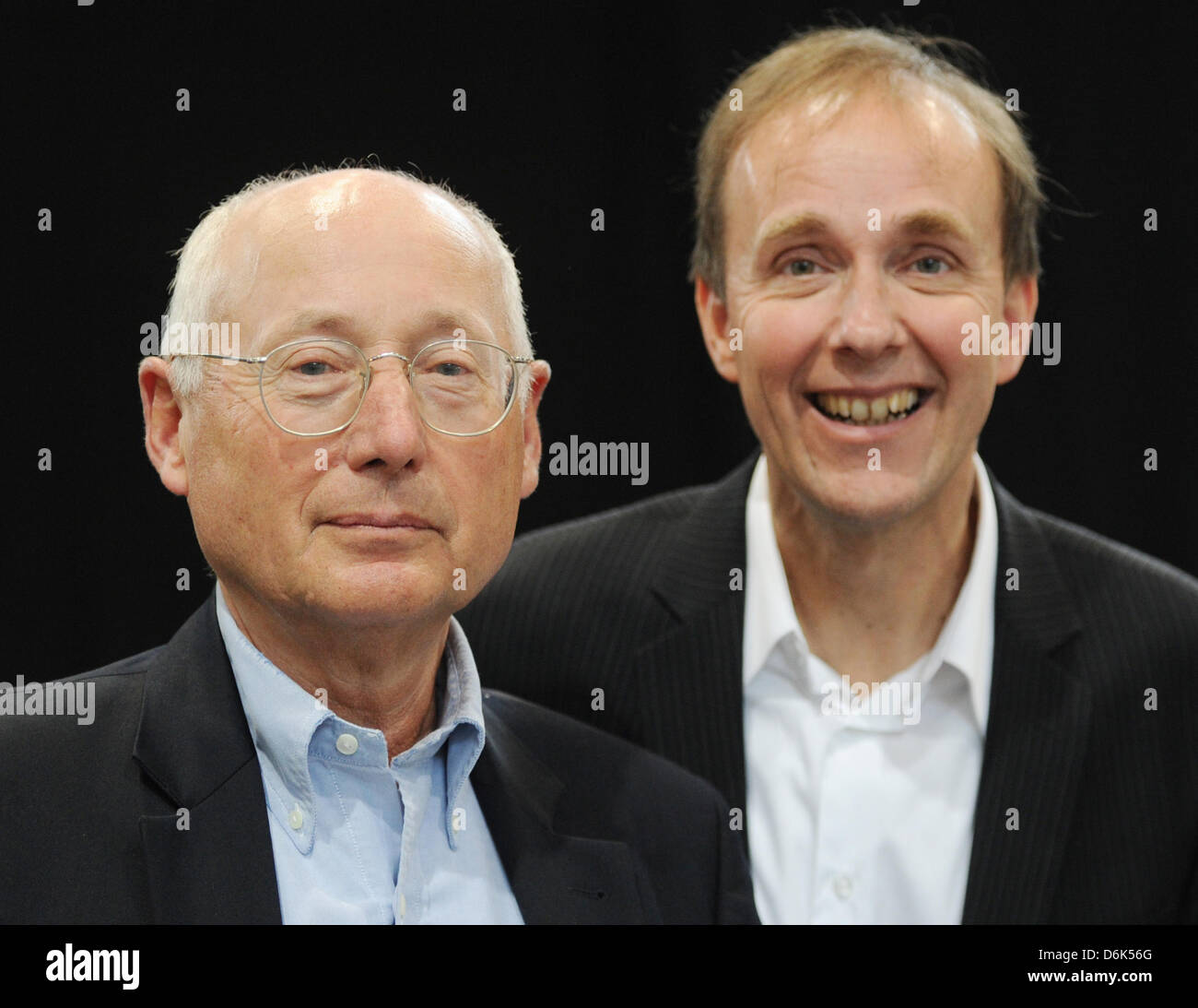 Stefan Aust (L) and Adrian Geiges smiel at the Leipzig Book Fair ...