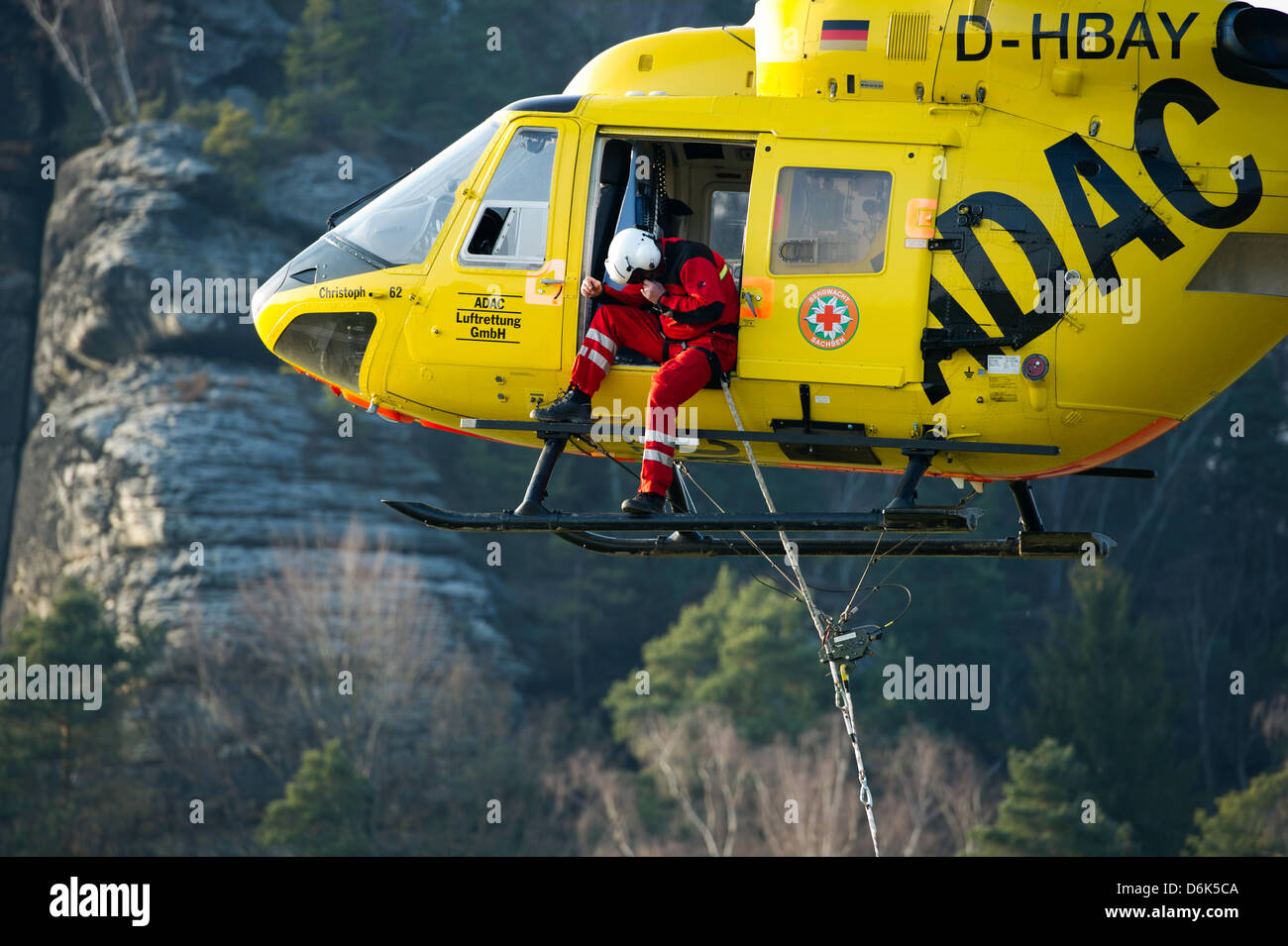 Rescue forces aboard helicopter 'Christoph 62' during a joint mountain ...