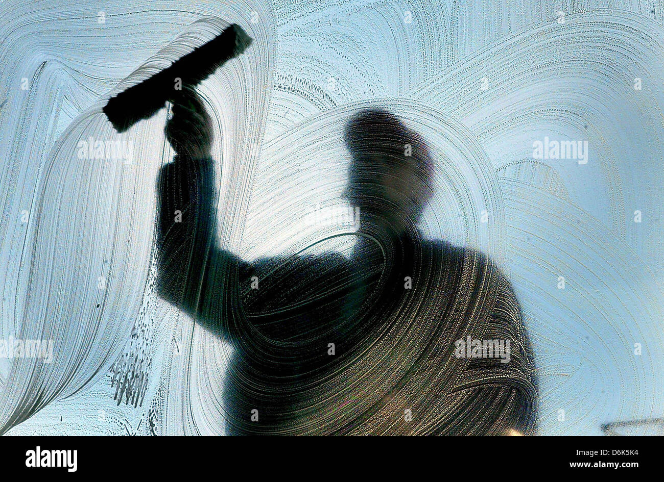 FILE - An archive picture dated 31 March 2005 shows a window cleaner ...