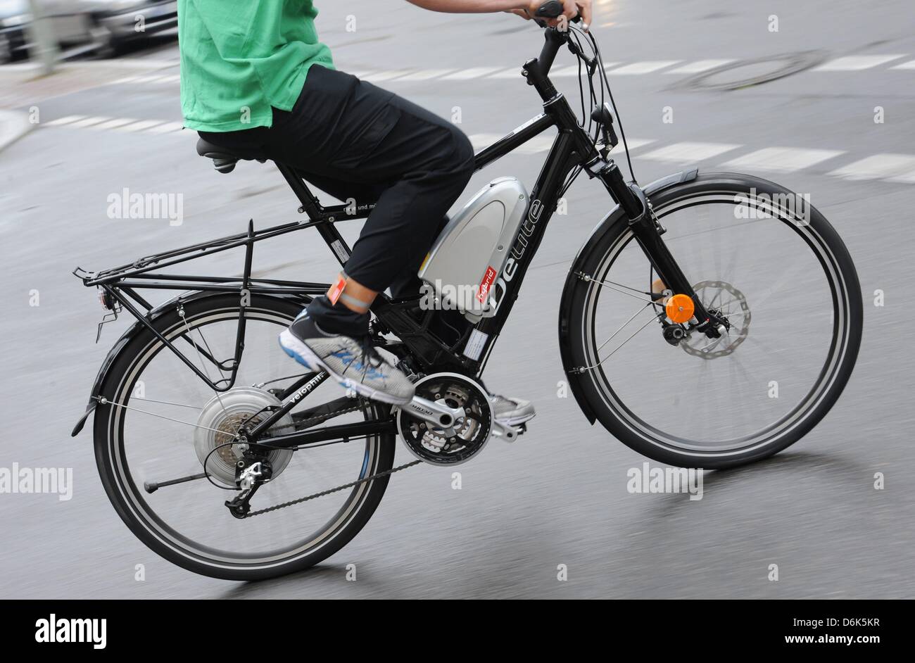 FILE - A file photo dated 28 July 2011 shows a man riding on an ...