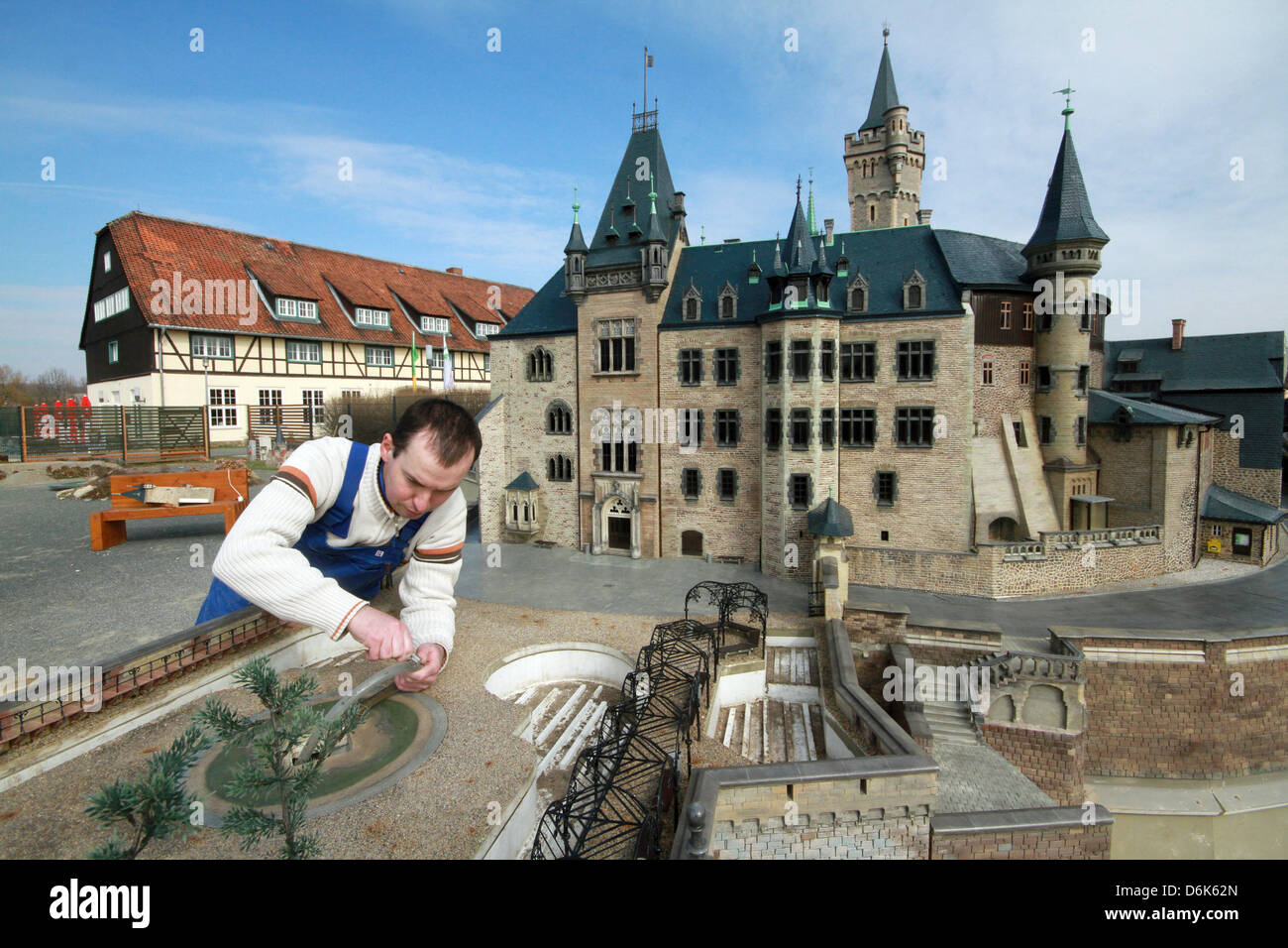 A staff member prepares a miniature in one of Germany's most beautiful ...