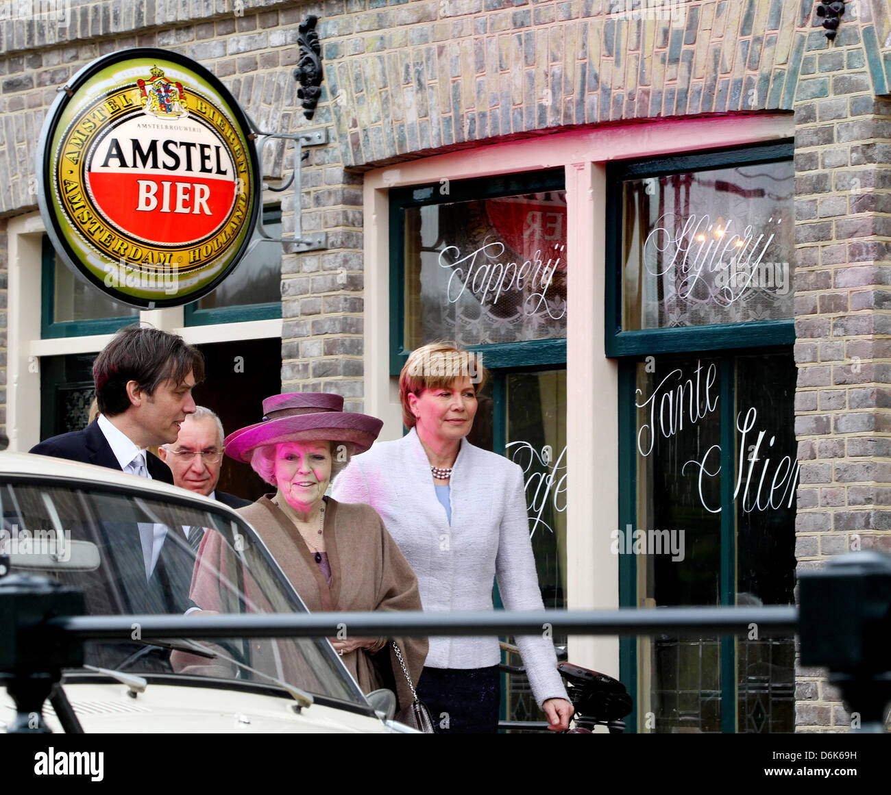 Dutch Queen Beatrix (C) leaves after the opening of the 'Amsterdam ...