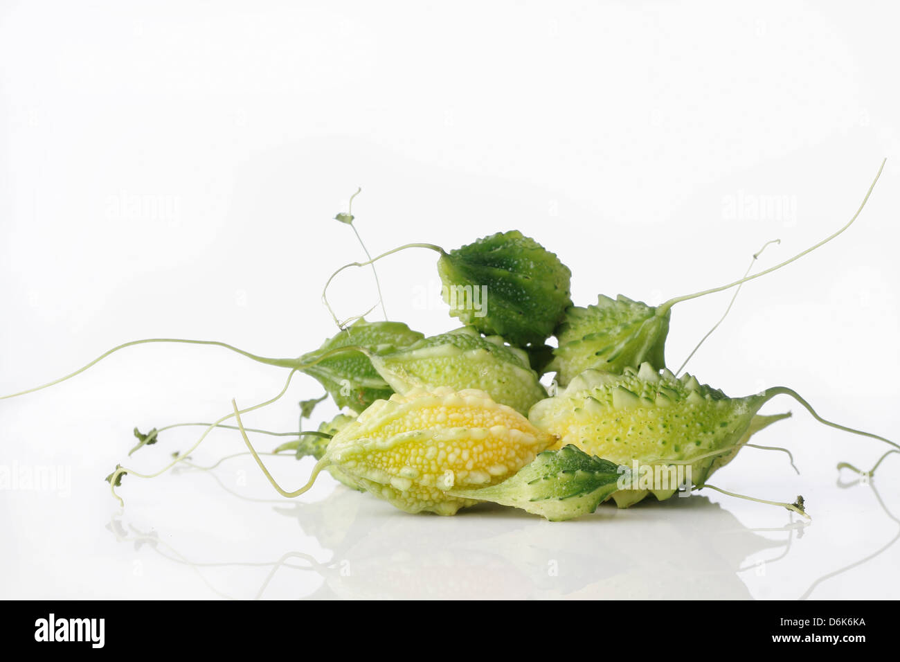 a group of bitter melon isolated on white Stock Photo - Alamy