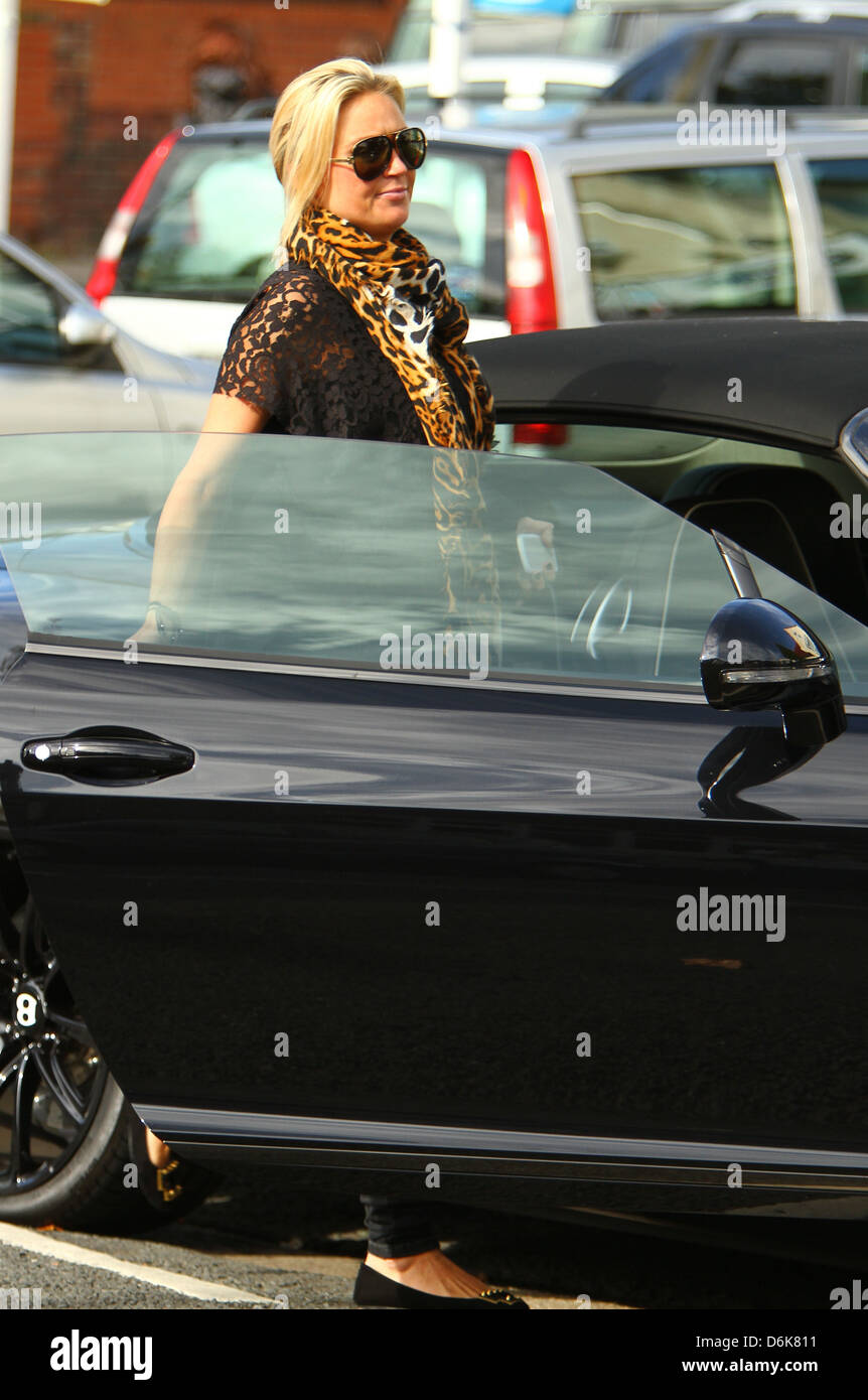 A pregnant Alex Gerrard leaves a coffee shop with a friend Liverpool ...