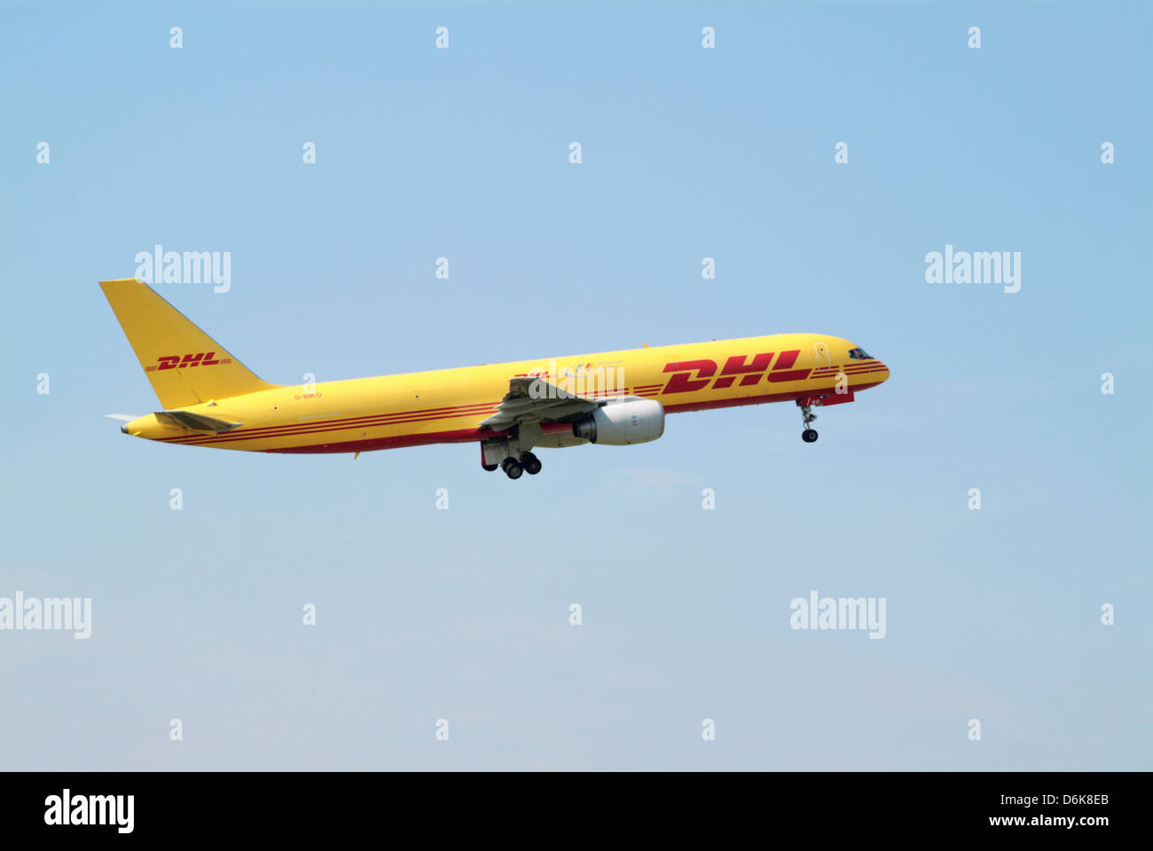 Boeing 757 cargo aircraft operated by DHL taking off Stock Photo - Alamy