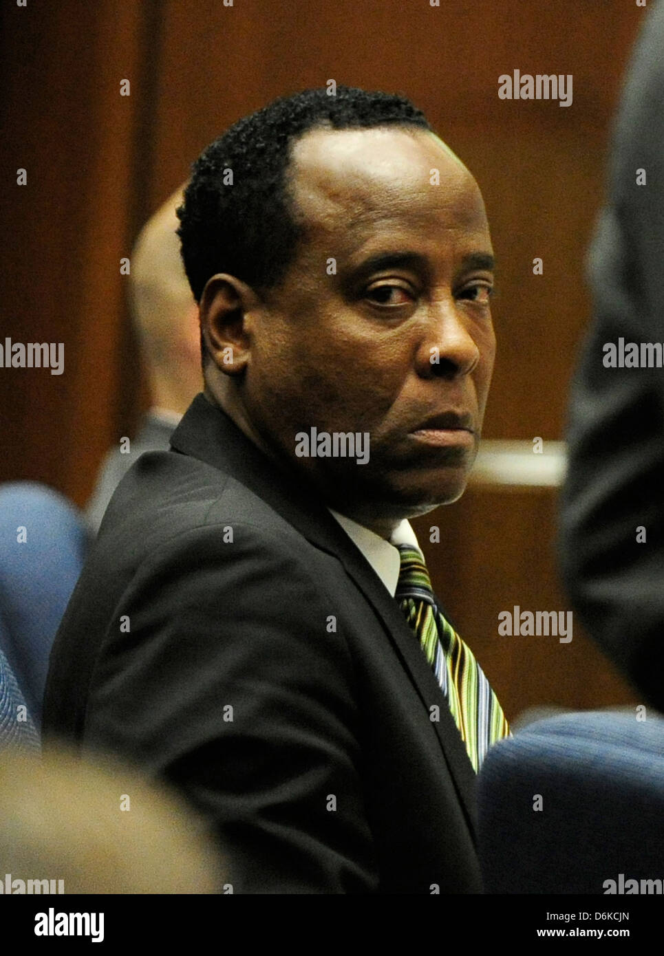 Dr. Conrad Murray listens during testimony by Dr. Paul White, an ...