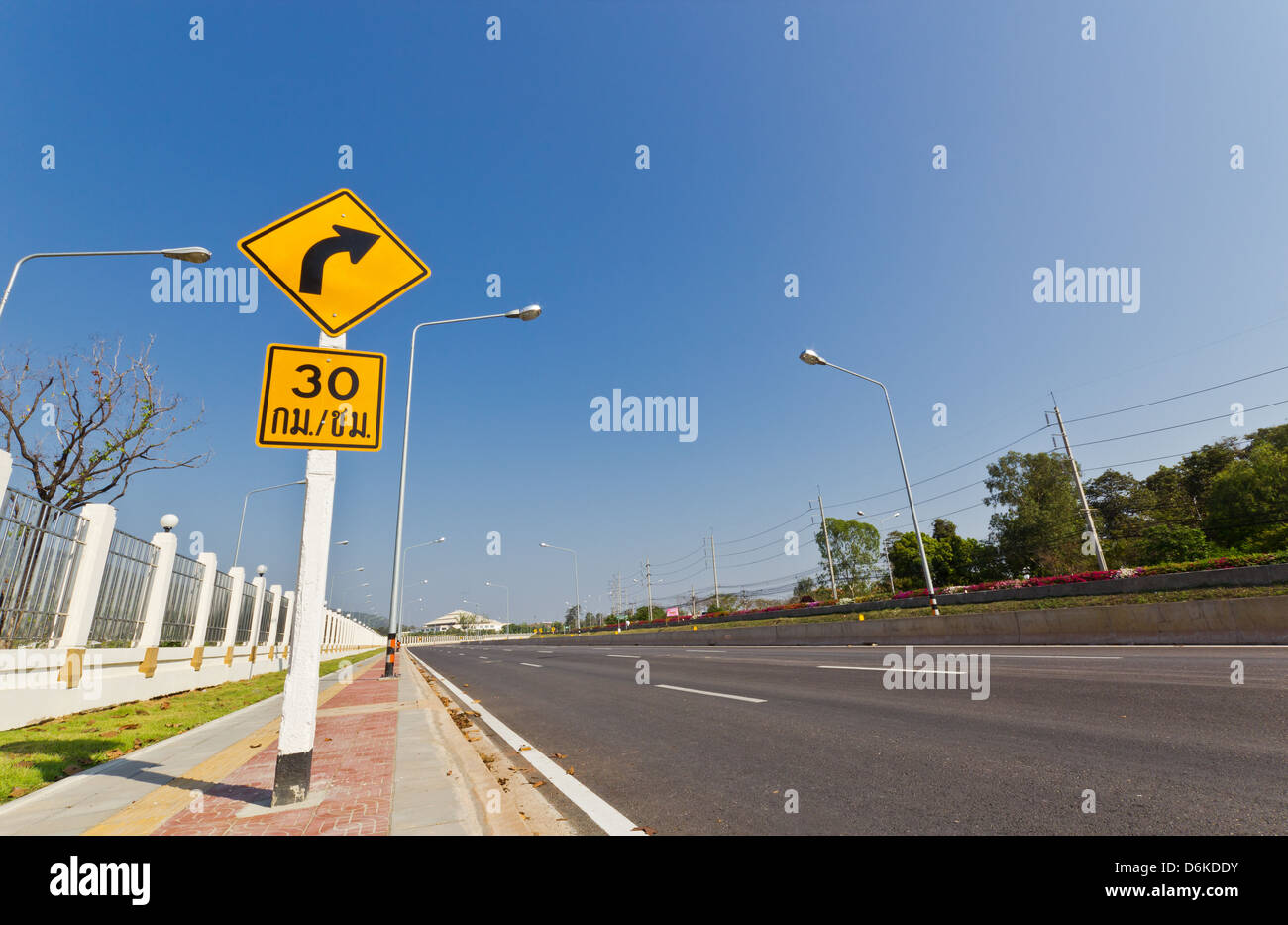 Distance Highway Road and Traffic Sign with Background of Blue Sky in a ...