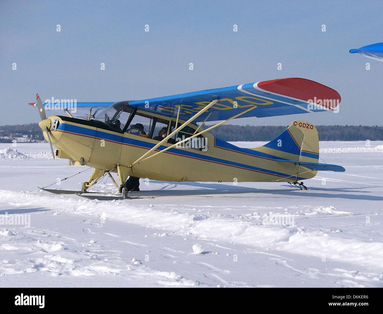 A classic Aeronca 7AC Champ aircraft in flight, showcasing its design ...