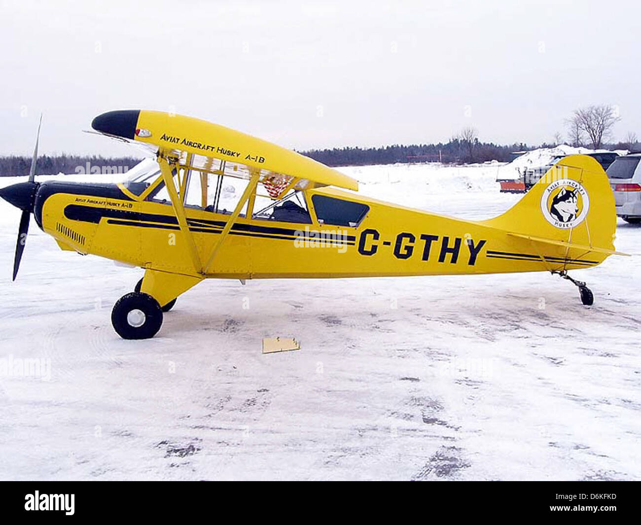 This image features the Aviat A-1B Husky C-GTHY aircraft, a light ...