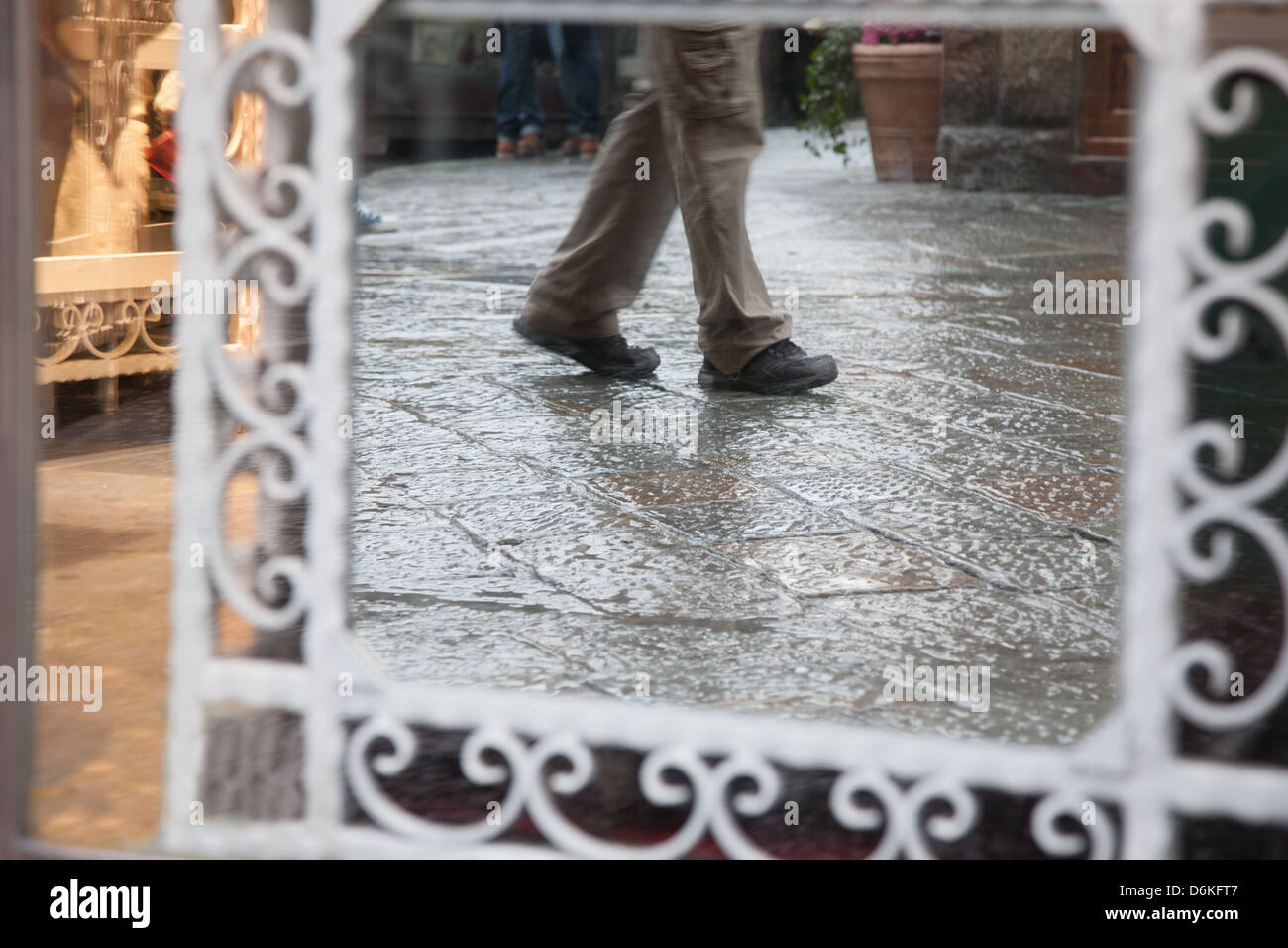 Man Walking Reflected in a Shop Window Mirror, Florence, Italy Stock ...