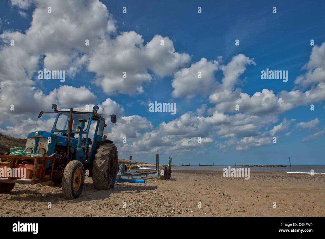 Tractor in the Sand Stock Photo - Alamy