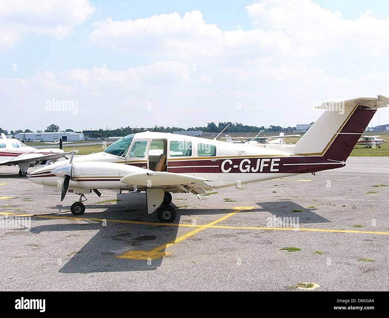 This image features a Beechcraft 76 Duchess, a twin-engine aircraft ...