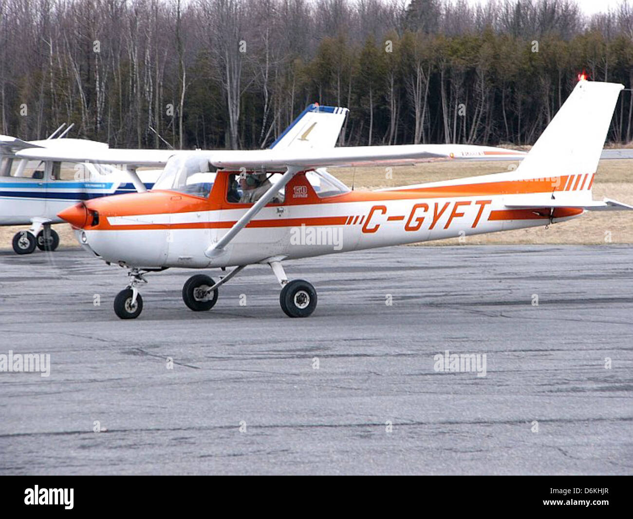 This image shows a Cessna 150MC-GYFT, a small, single-engine aircraft ...