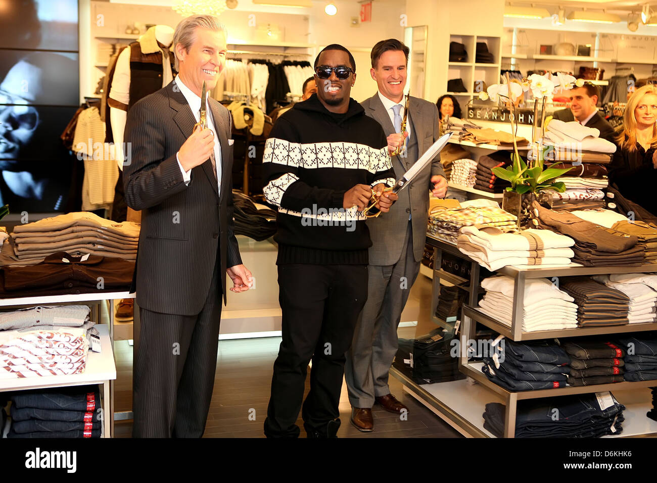 Terry J. Lundgren and Sean Combs aka Diddy attend a ribbon cutting to ...
